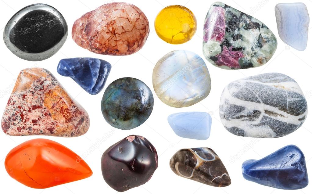 Many tumbled ornamental gem stones isolated Stock Photo by ©vvoennyy ...