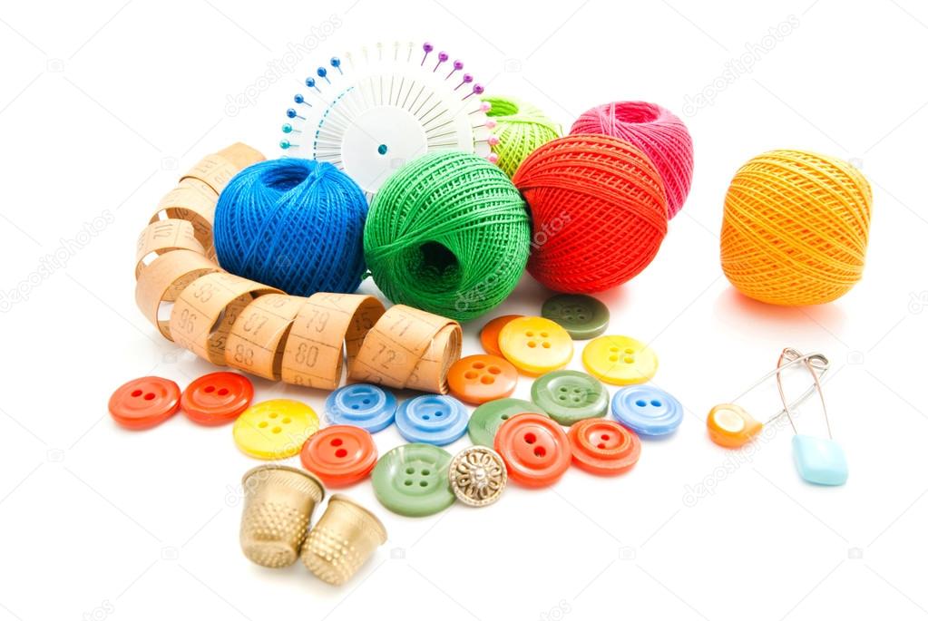 Meter, pins, plastic buttons and thread — Stock Photo © BiggimoT #108248950