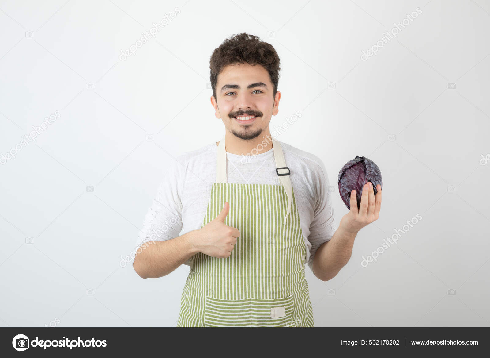 Smiling Young Guy Holding Cabbage Gesturing Thumb High Quality Photo ...