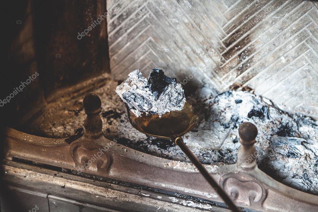 Ash from fire lay extinguished on brass blade Stock Photo by ©glebchik ...