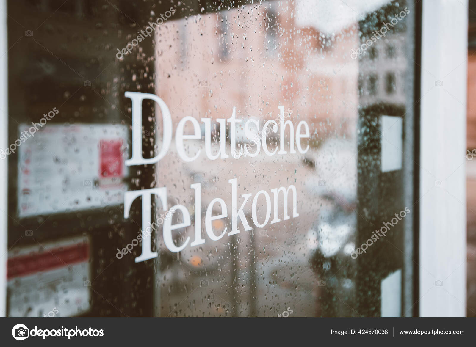 Rain drops over traditional German Telecom phone booth — Stock ...