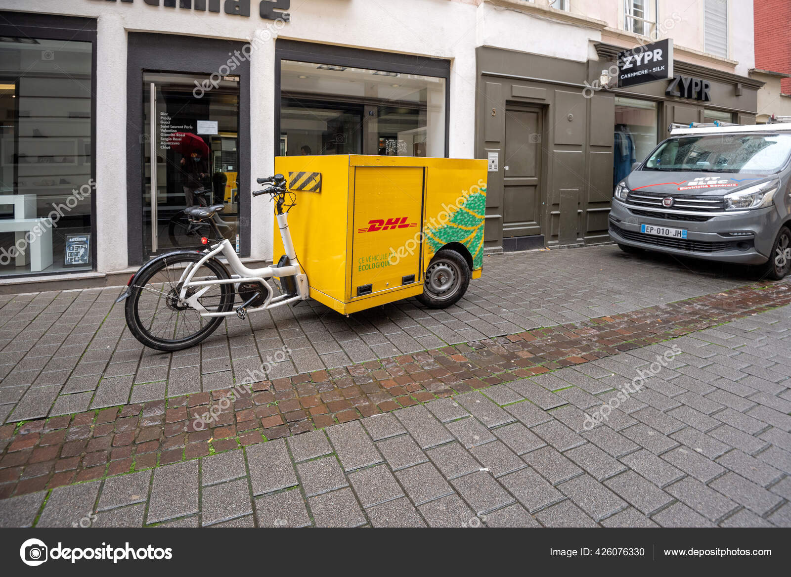 DHL electric delivery parcel bike parked in front – Stock Editorial ...