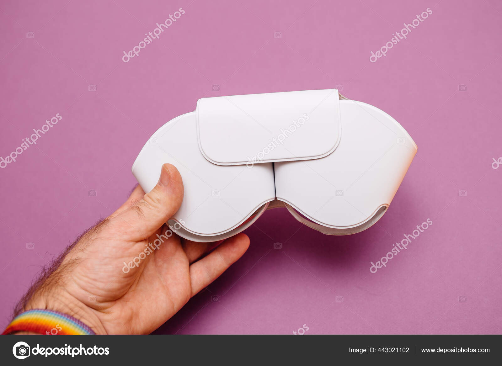 Apple Computers AirPods Max over-ear headphones against violet clean ...