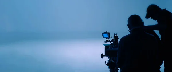 Video production behind the scenes. Making of TV commercial movie that film crew team lightman ...