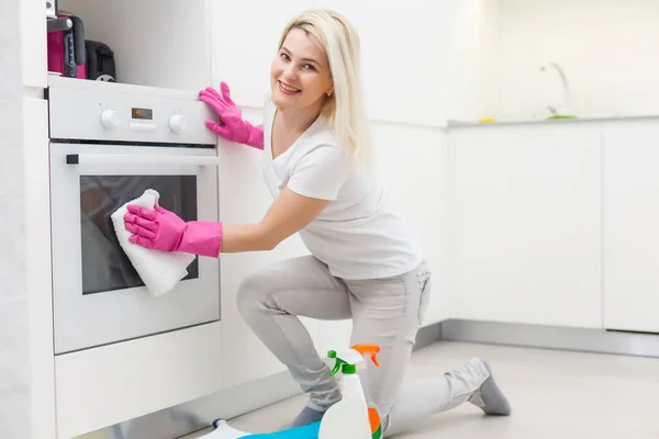 Woman doing housework Stock Photos, Royalty Free Woman doing housework ...