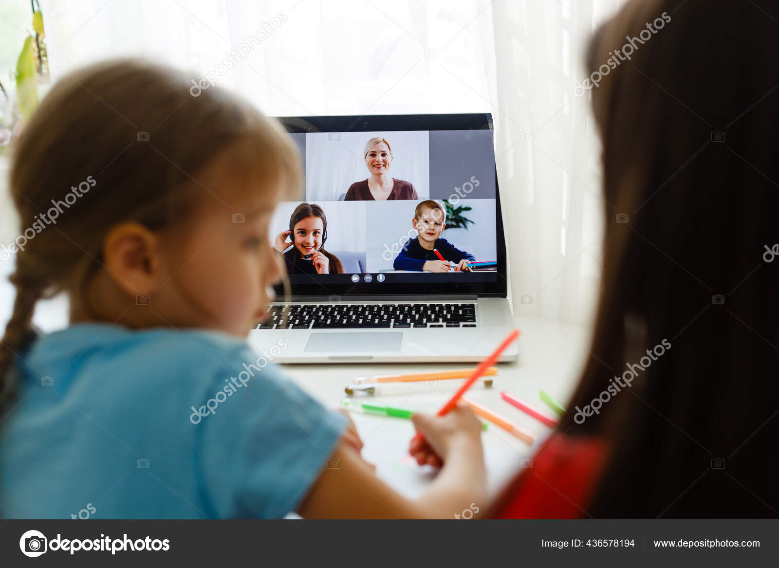 Cool online school. Kids studying online at home using a laptop ...