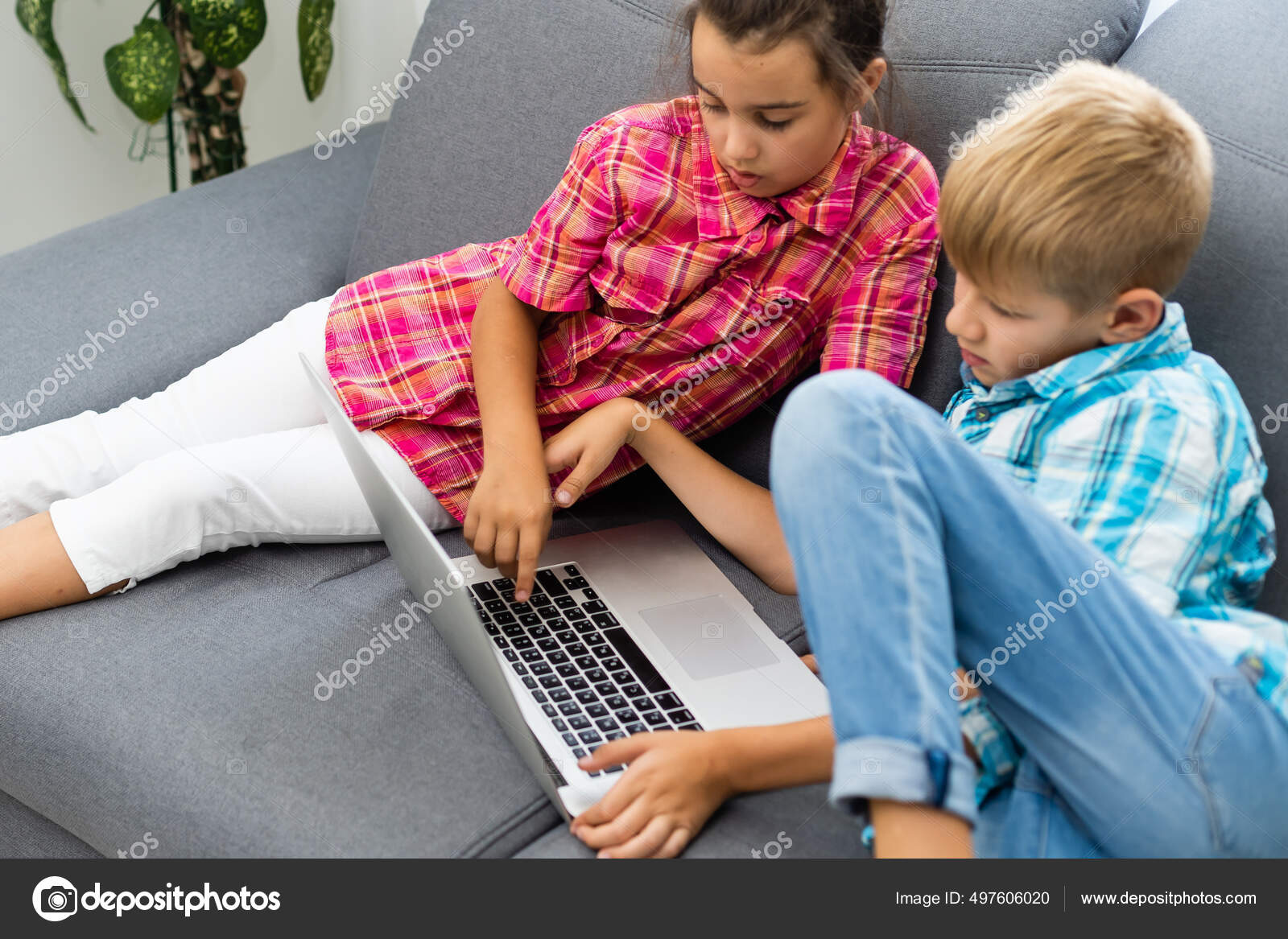 Cute children use laptop for education, online study, home studying ...