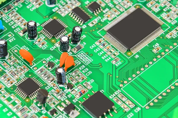 Green computer motherboard Stock Photo by ©unkas 113326602