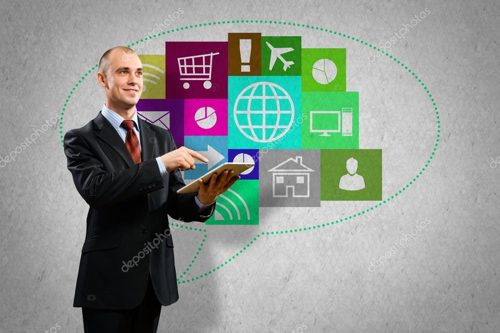 Businessman and user interface Stock Photo by ©Khakimullin 103123688