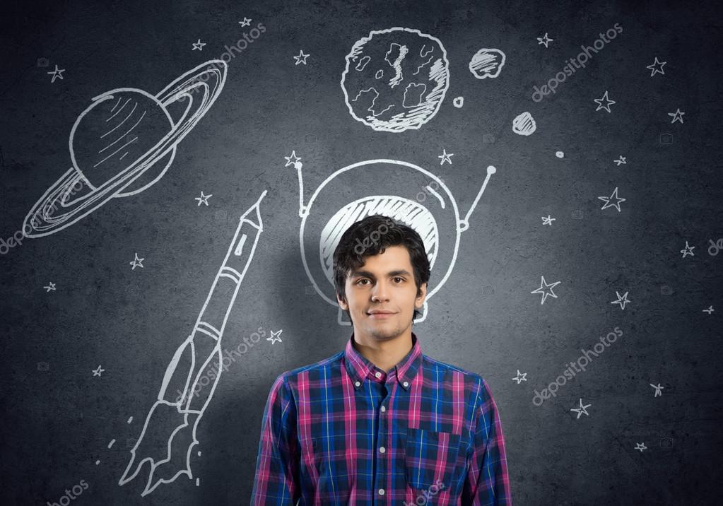 Guy dreaming to become astronaut — Stock Photo © Khakimullin #113931278 Guy dreaming to become astronaut — Stock Photo © Khakimullin #113931278