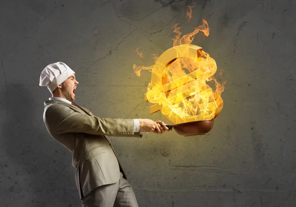 Businessman with pan - Stock Image - Everypixel