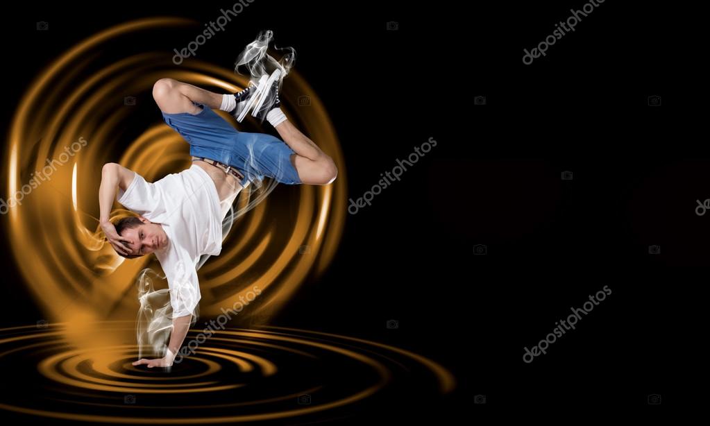 Breakdancer standing on hand Stock Photo by ©Khakimullin 65259133