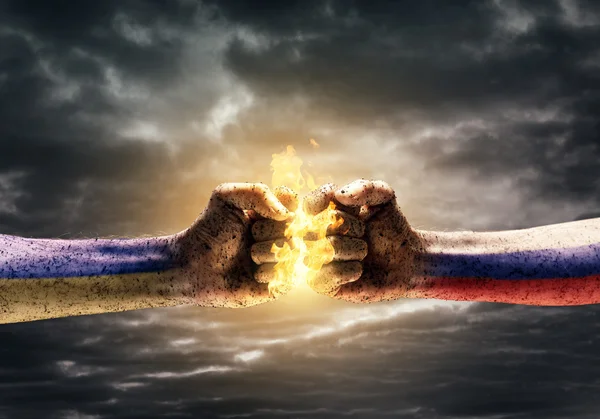 Two fists hitting each other Stock Photo by ©Khakimullin 103125142