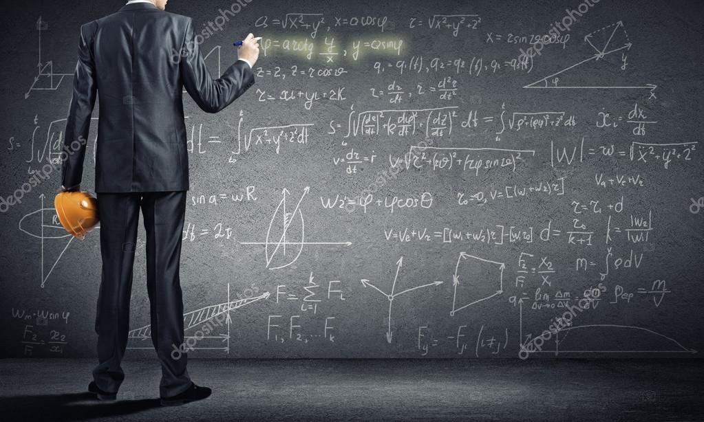 Man engineer drawing formulas — Stock Photo © Khakimullin #86520710
