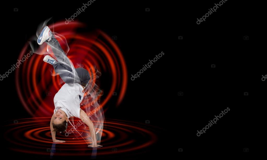 Breakdancer performing hands stand Stock Photo by ©Khakimullin 86523912