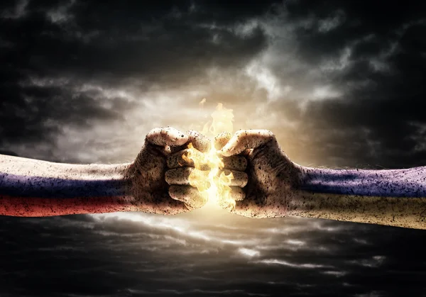 Two fists hitting each other Stock Photo by ©Khakimullin 86532330