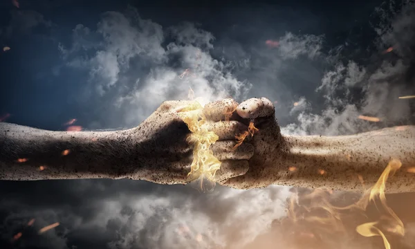 Two fists hitting each other Stock Photo by ©Khakimullin 86532330
