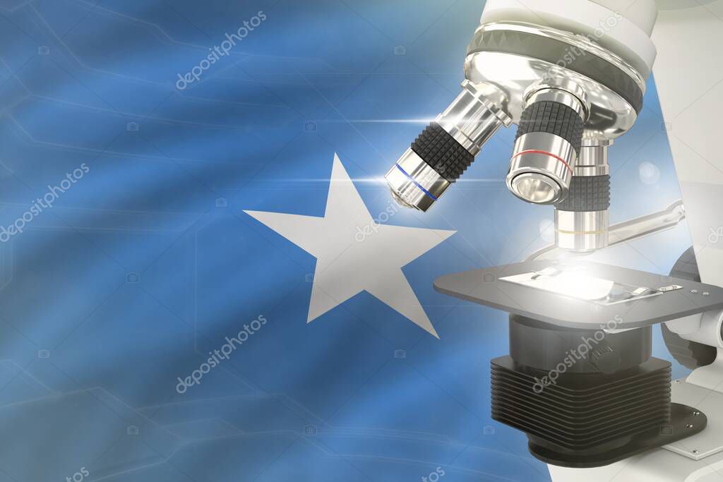 Somalia science development concept - microscope on flag background ...