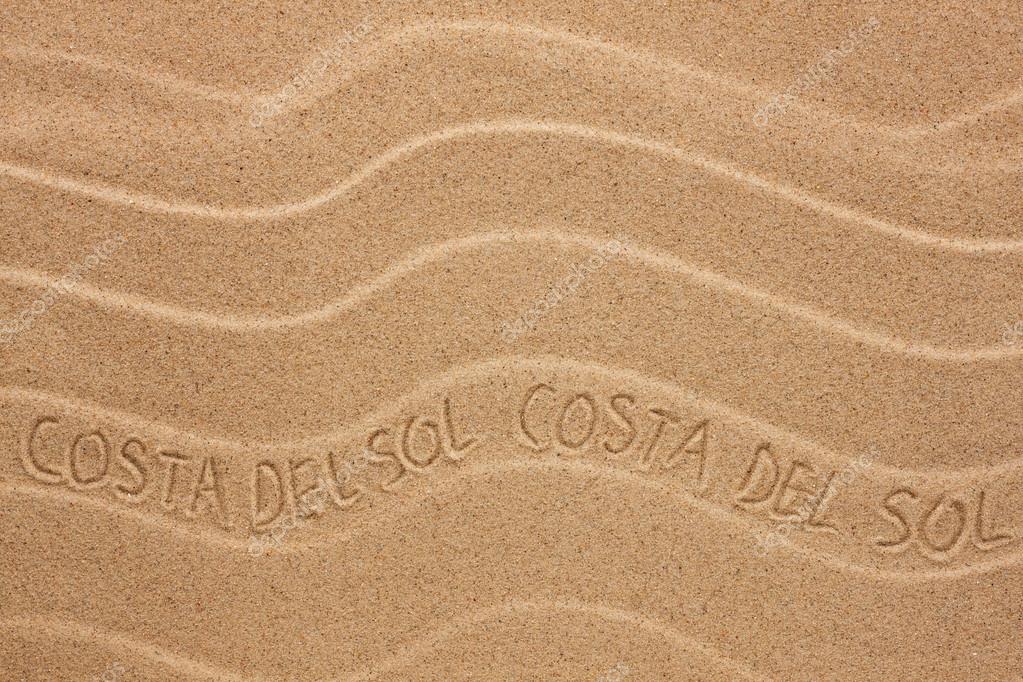 Costa del Sol inscription on the wavy sand — Stock Photo © alekleks ...