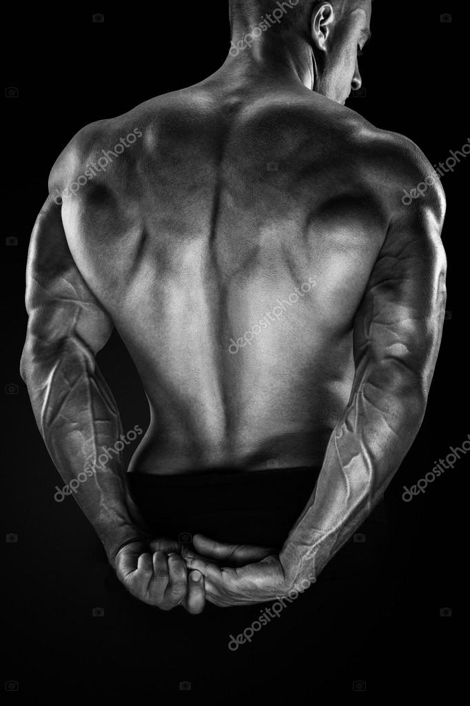 Handsome power bodybuilder showing his back Stock Photo by ©Improvisor ...