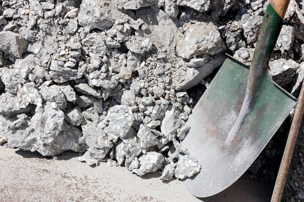 Construction debris made of crushed stone and paving slabs and scoaf ...