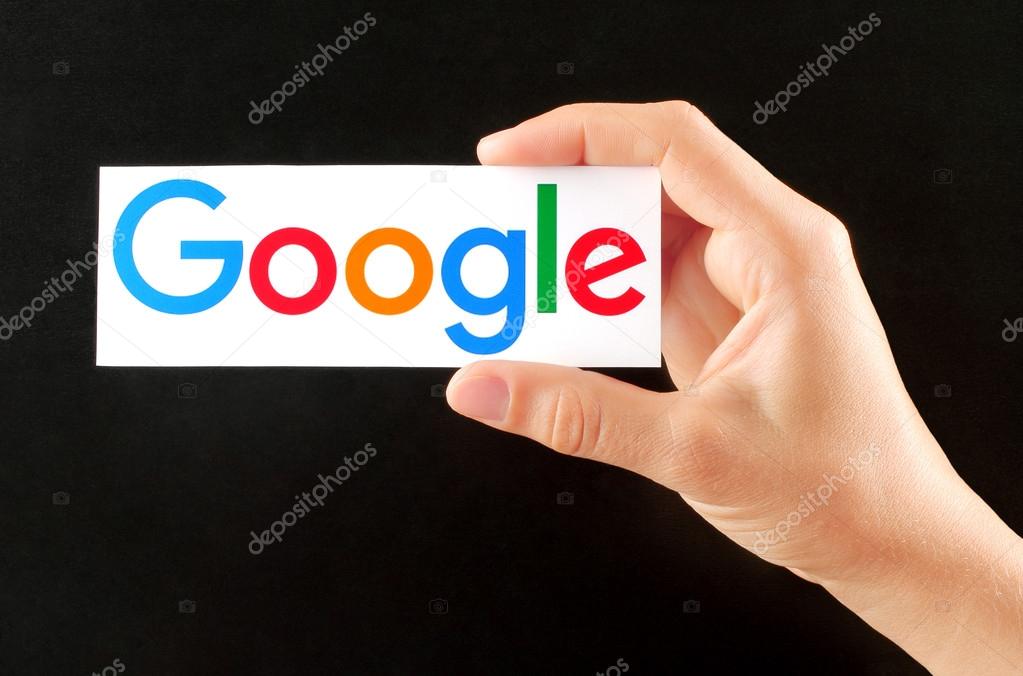 Hand holds new Google logotype – Stock Editorial Photo © rozelt #96115002