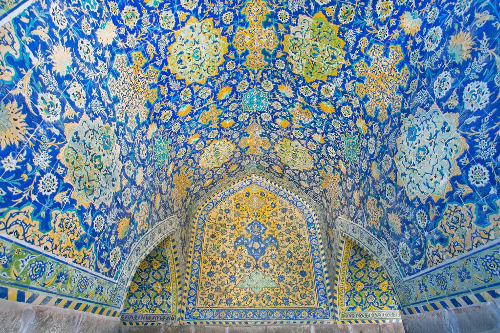 Ceramic tile of the arched entrance of the historic mosque in Isfahan ...