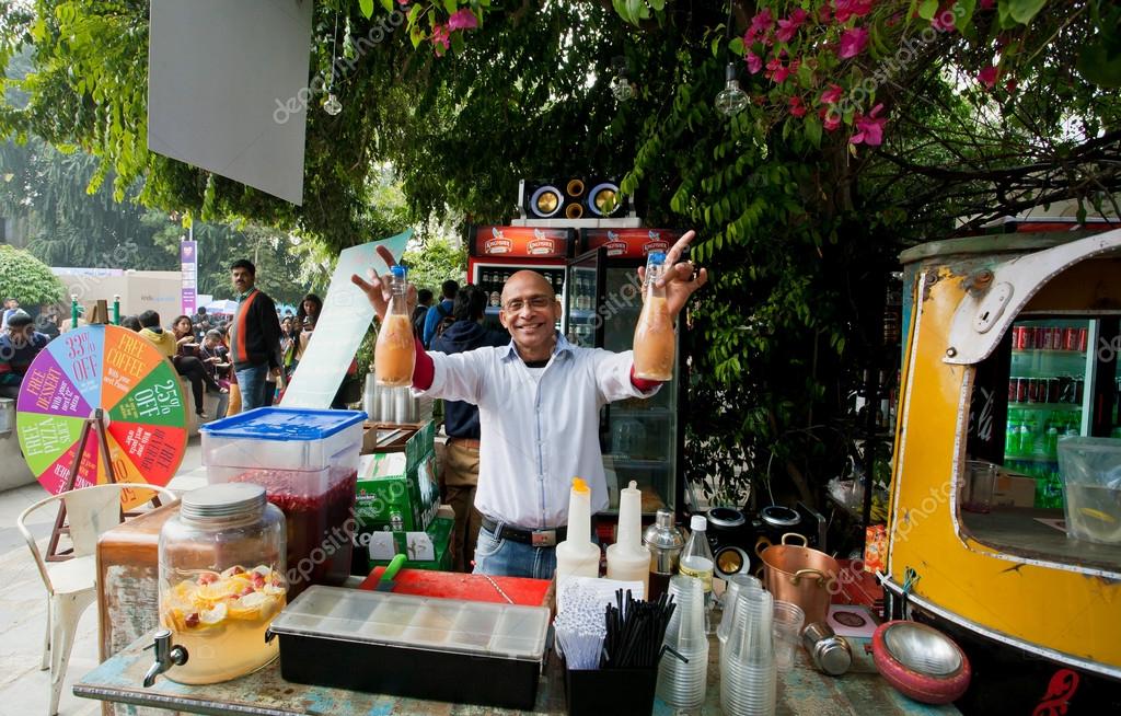 Bartender standing behind the weird retro style street bar – Stock ...