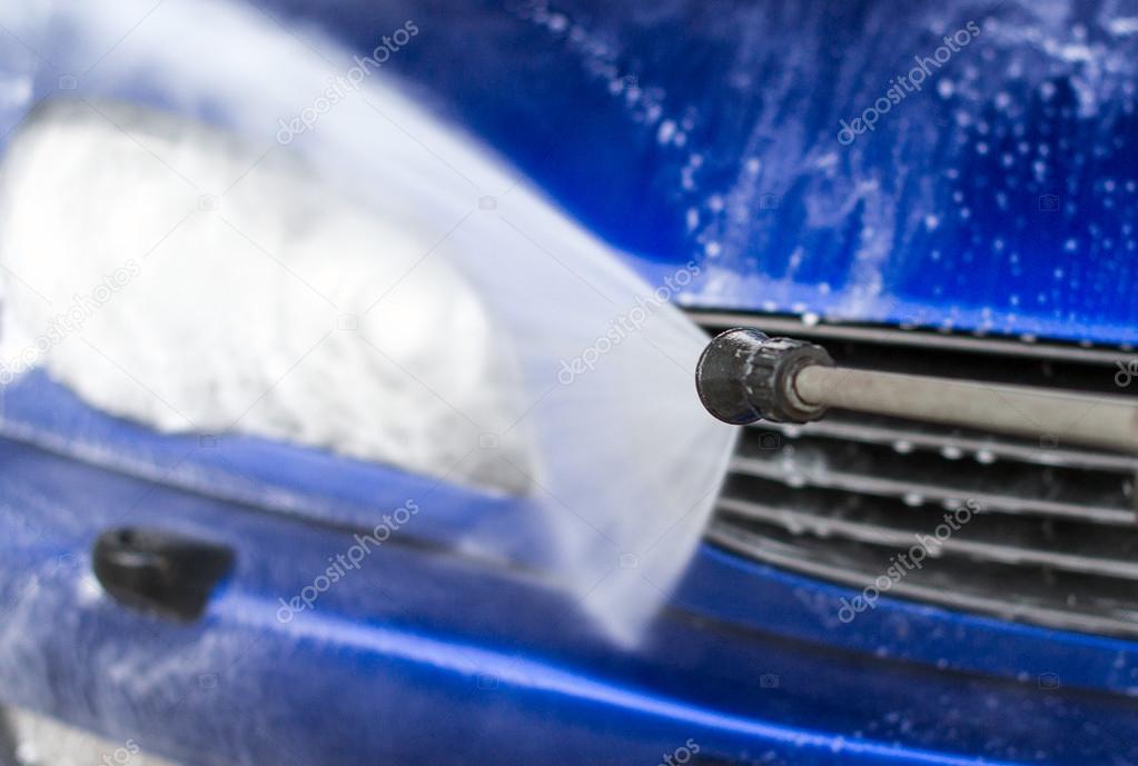Blue car wash using high pressure water jet. — Stock Photo ...