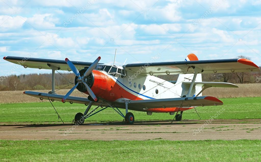 Old biplane aircraft in the airport. Stock Photo by ©mproduction 72459423