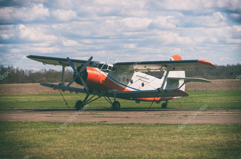 Old biplane aircraft in the airport. Vintage effect. Stock Photo by ...