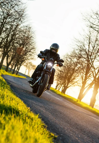 Young man driving chopper — Stock Photo © jag_cz #107449990
