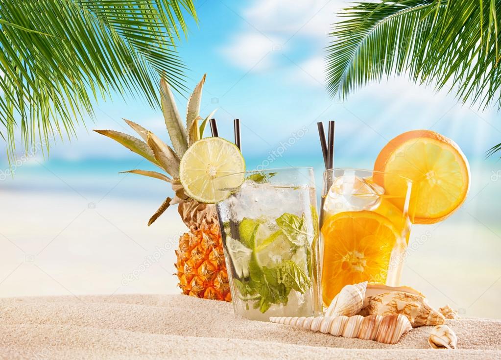 Summer drinks on beach Stock Photo by ©jag_cz 114888472
