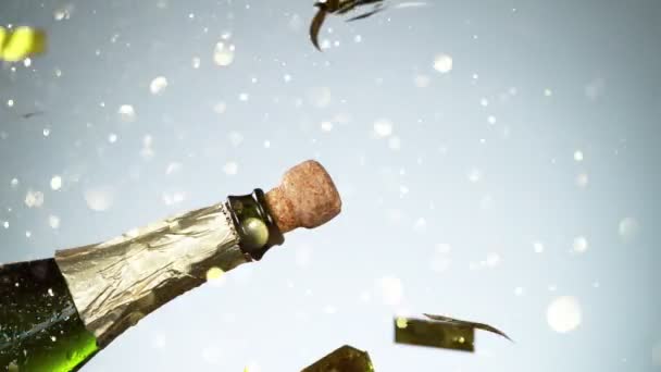 Two champagne glasses with champagne bottle explosion. Cheers ...