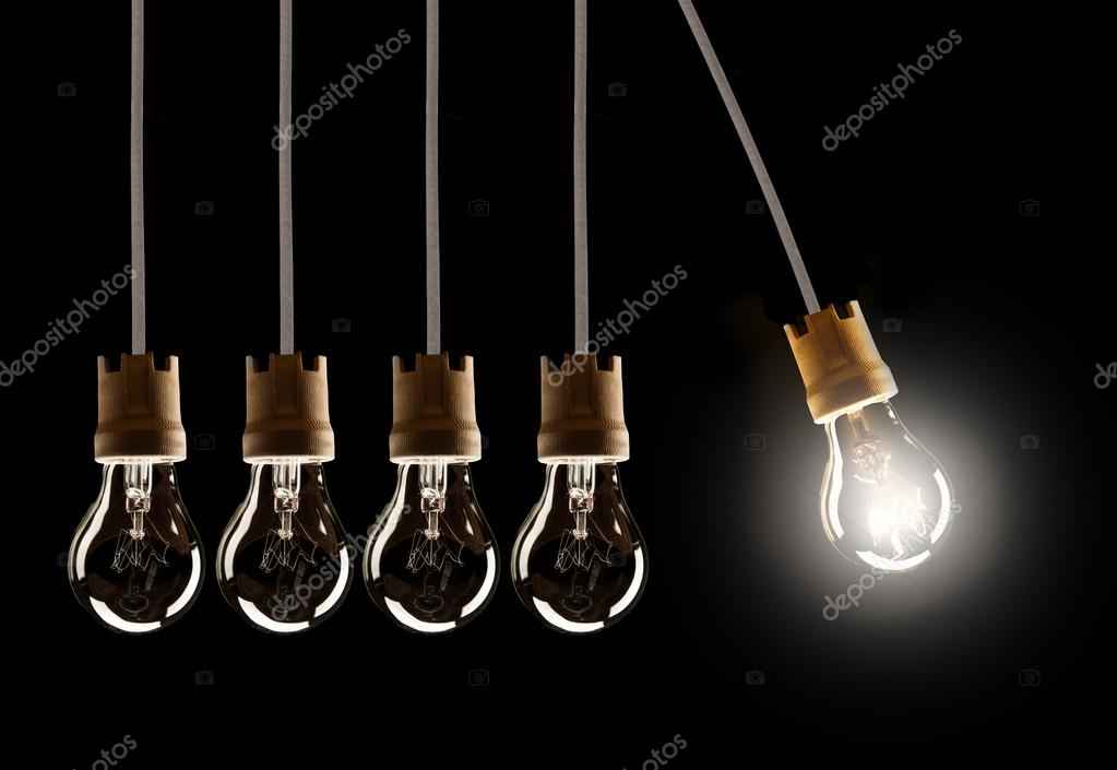 Light bulbs in row with single one shinning Stock Photo by ©jag_cz 70219359