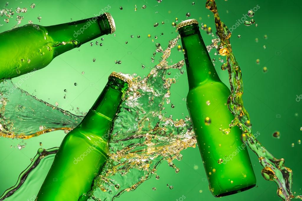 Bottles of beer with splash, on green background Stock Photo by ©jag_cz ...