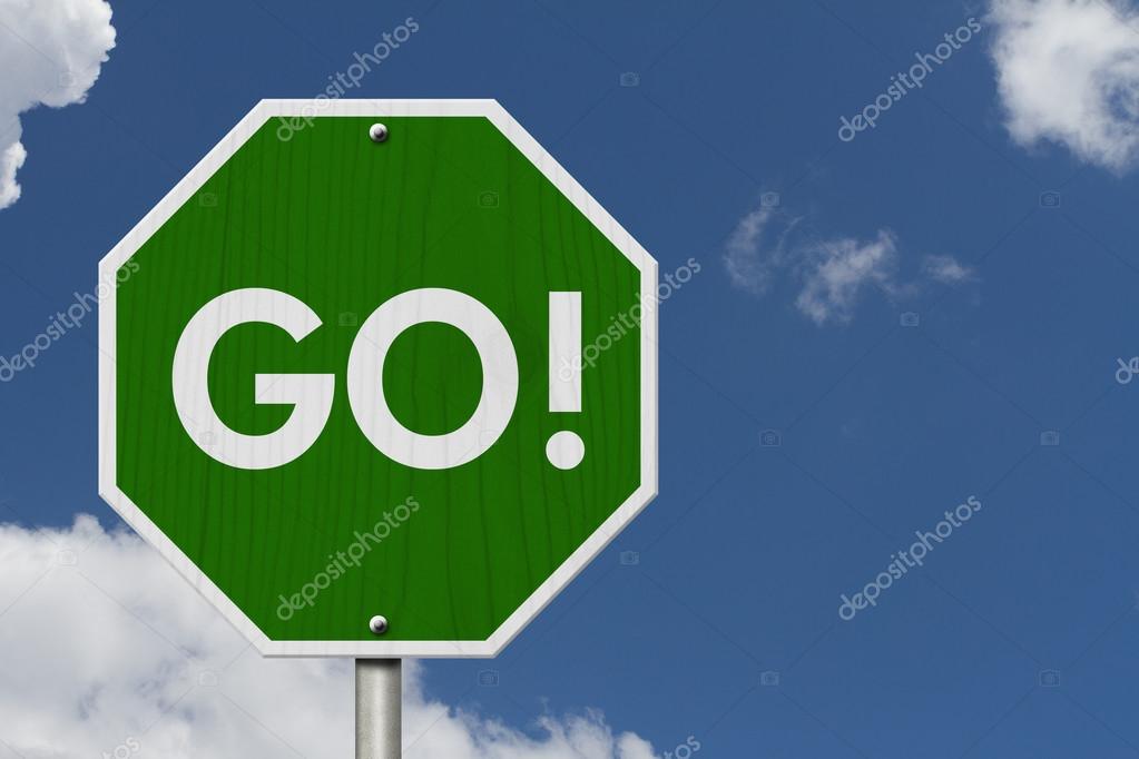Green Go highway road sign Stock Photo by ©karenr 123437810