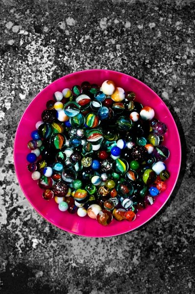 Glass marbles in container Pictures, Glass marbles in container Stock ...