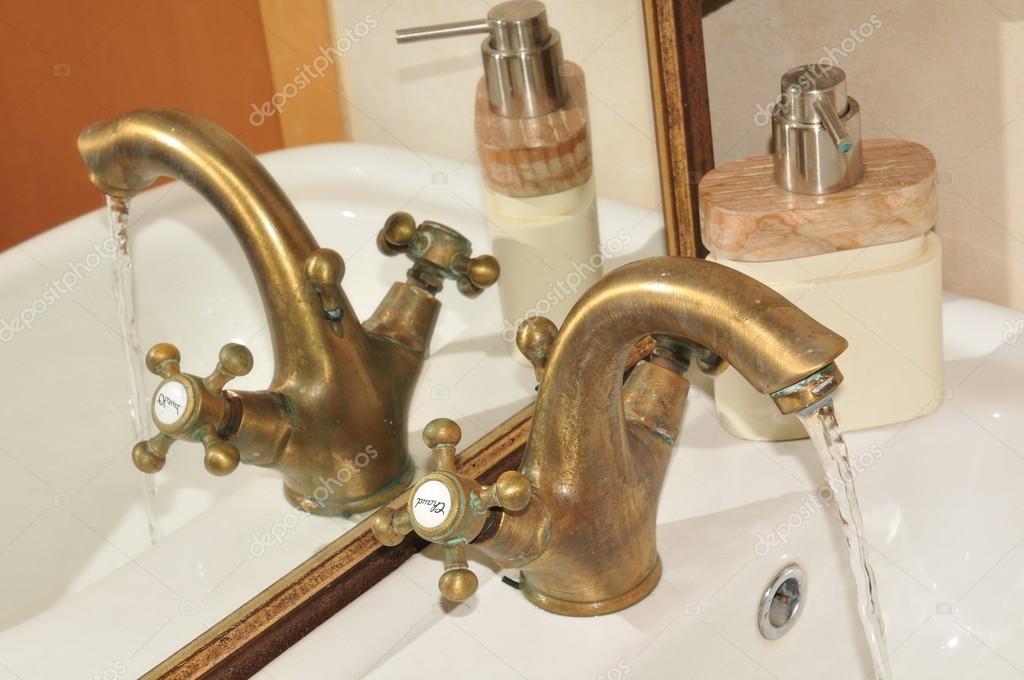 Vintage tap Stock Photo by ©lucianmilasan 81238702