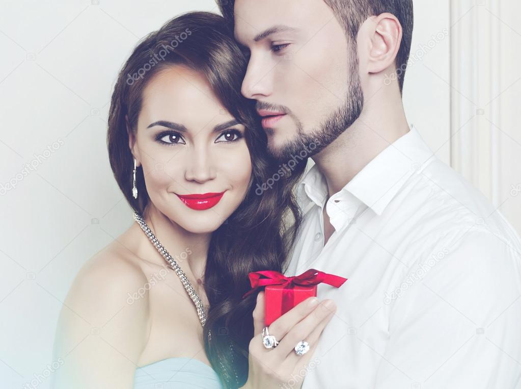 Romantic couple with gift — Stock Photo © korobkova #60283865