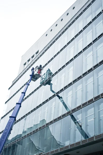 Building window cleaning Stock Photos, Royalty Free Building window ...