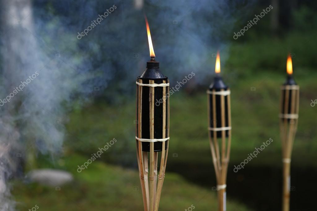 Bamboo torches burn Stock Photo by ©Vaitekune 124658382