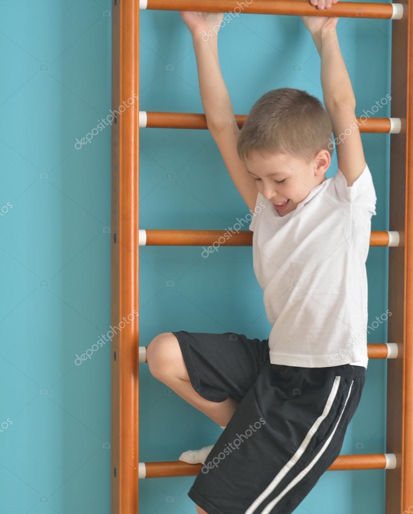Boy jumps off the ladder Stock Photo by ©nshirokova 70809881