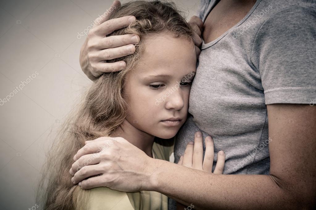 Portrait of one sad daughter hugging his mother — Stock Photo ... Portrait of one sad daughter hugging his mother — Stock Photo ...