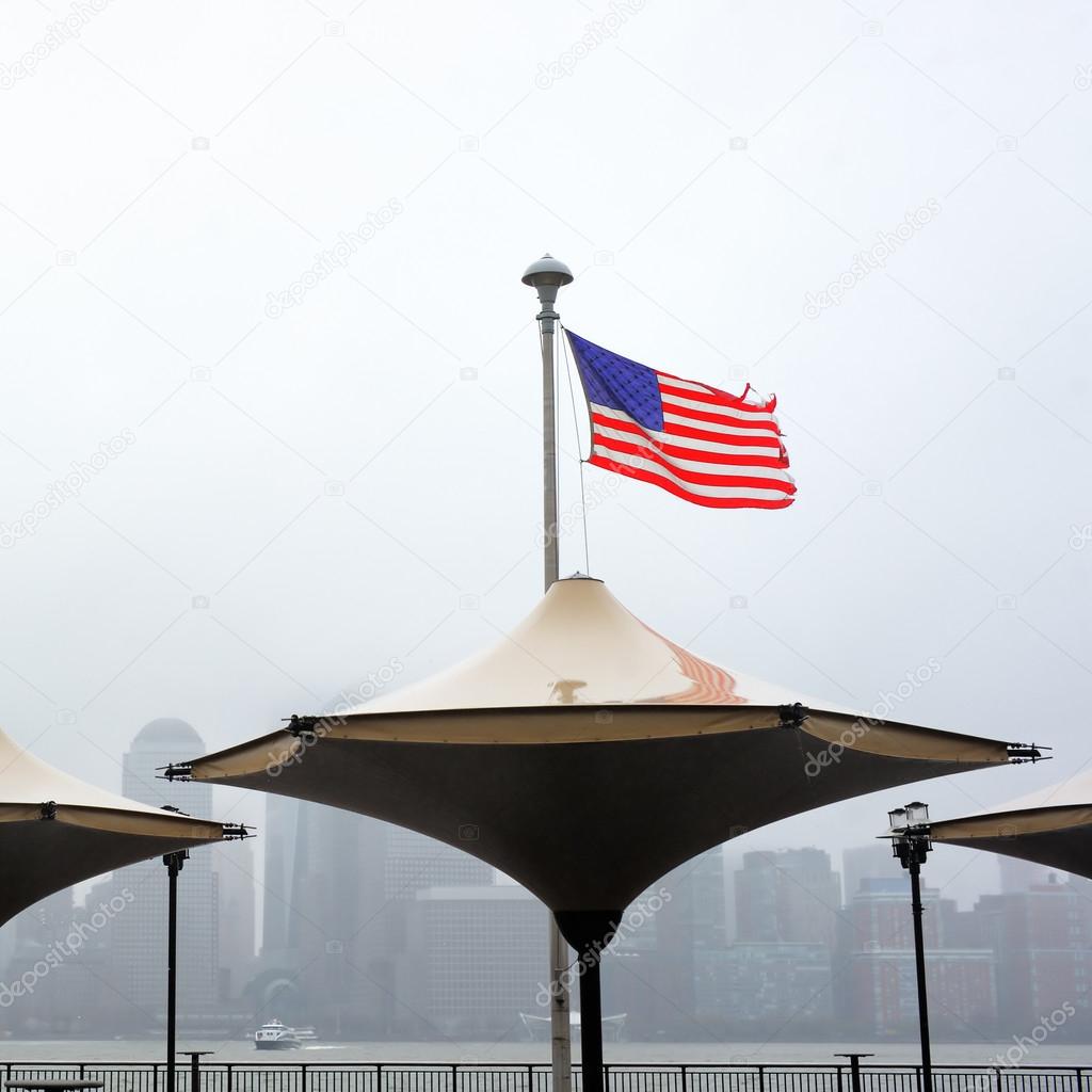 Tattered American flag blowing in the wind Stock Photo by ©mary_smn ...