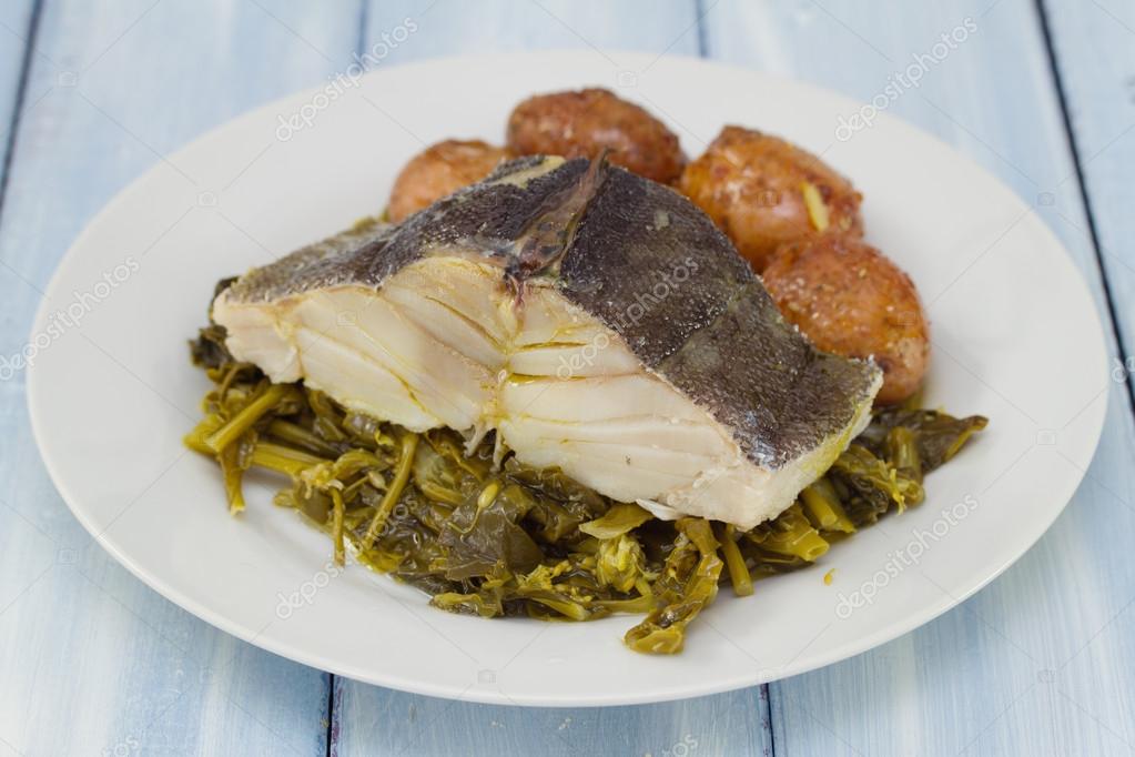 Cod fish with potato and vegetables on white plate Stock Photo by ...