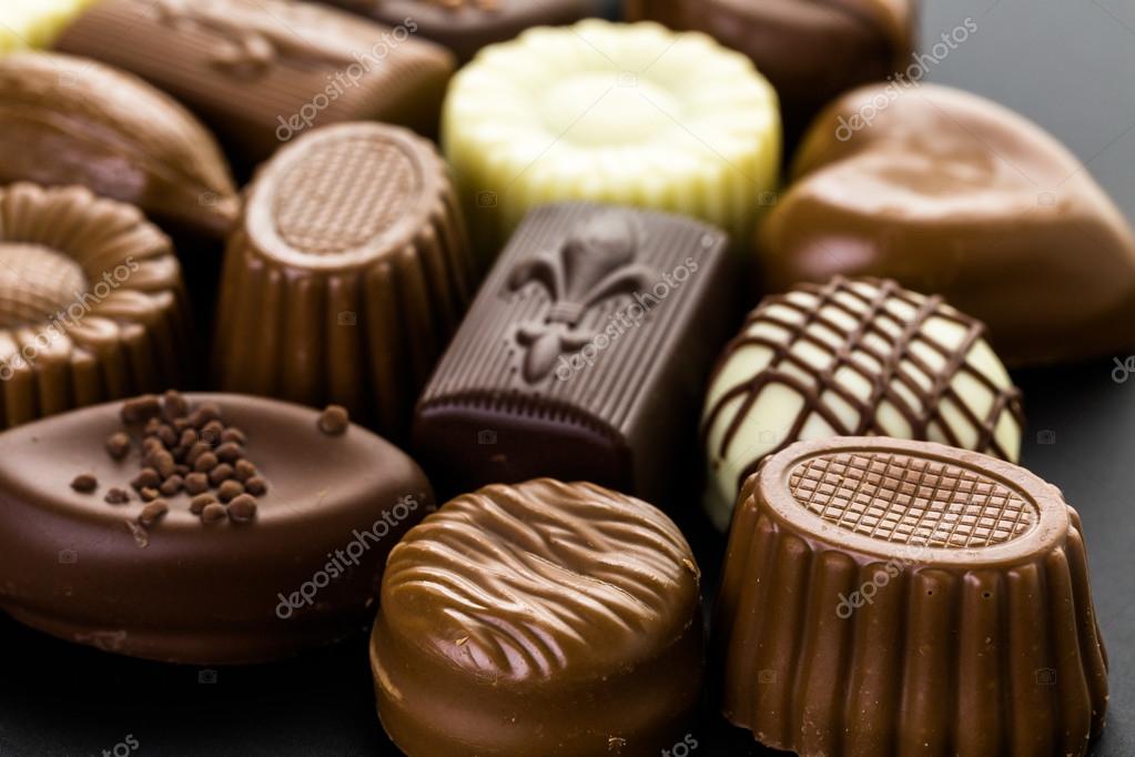 Assorted chocolates close up Stock Photo by ©urban_light 71060617