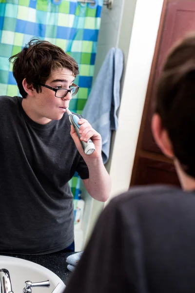 Teen brushing teeth Stock Photos, Royalty Free Teen brushing teeth ...