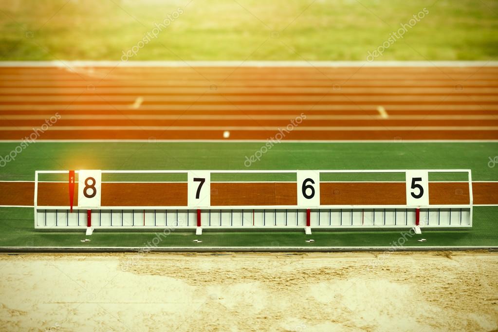 Athletics long jump sand pit with marks — Stock Photo © redstone #91527614