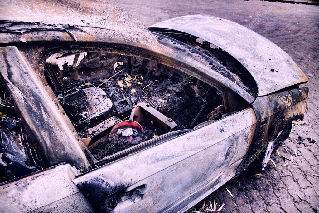 Completely burnt car Stock Photo by ©DarioStudios 59109389